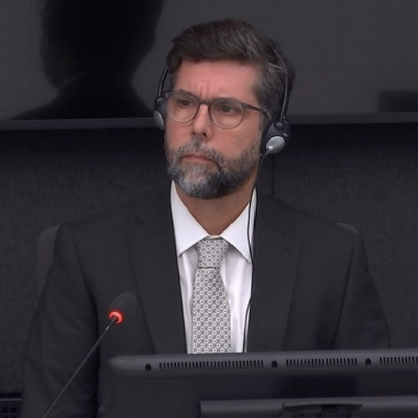 Visiting faculty member Fred Abrahams testifies in war crimes trial ...